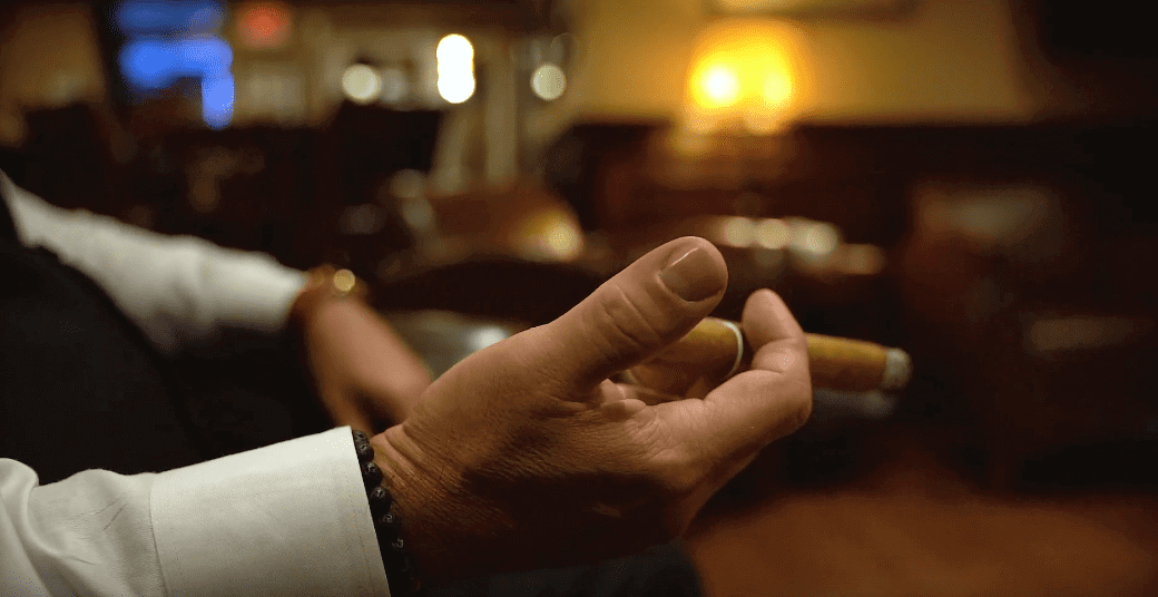 How To Hold a Cigar the Right Way: Tricks and Tips - SmokeProfy